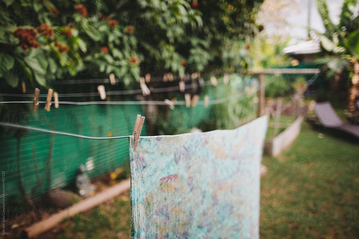 "Floral Sheet Hanging On Clothesline In Yard" by Stocksy Contributor ...