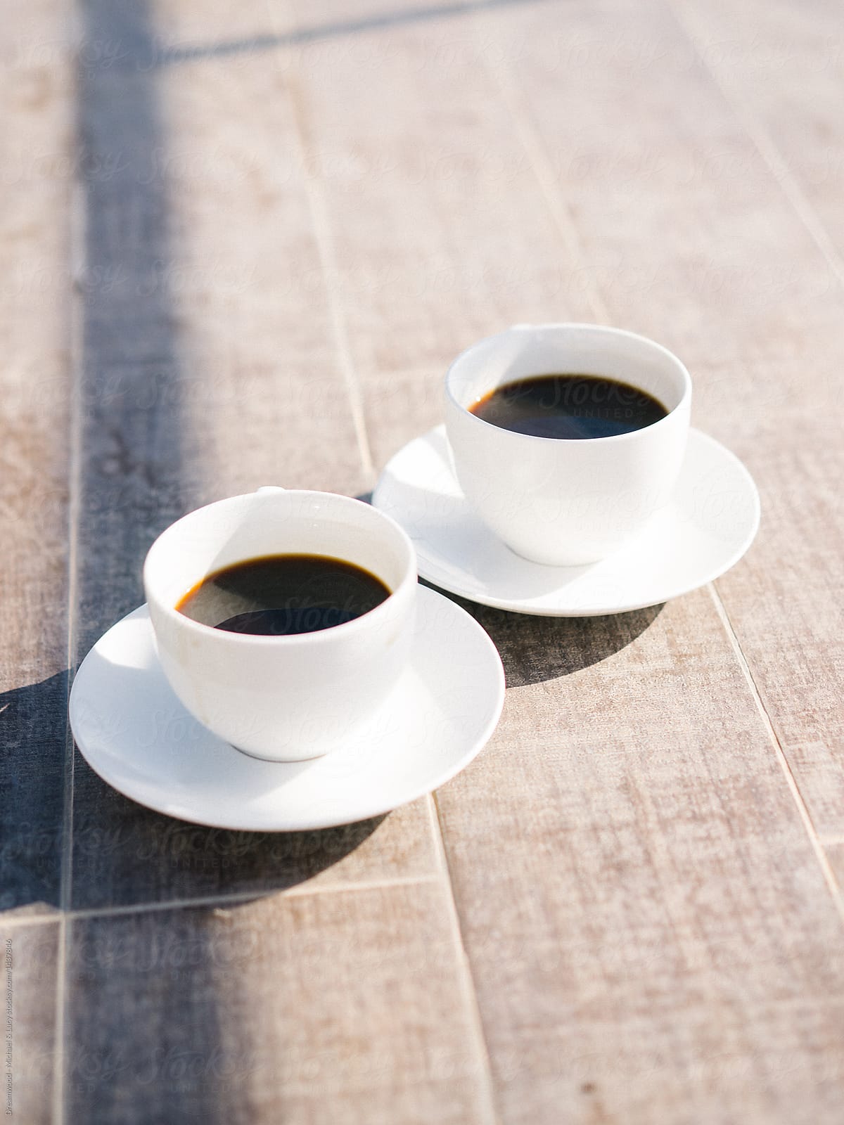 "Close-up Of Coffee Cups" by Stocksy Contributor "Dreamwood Photography ...