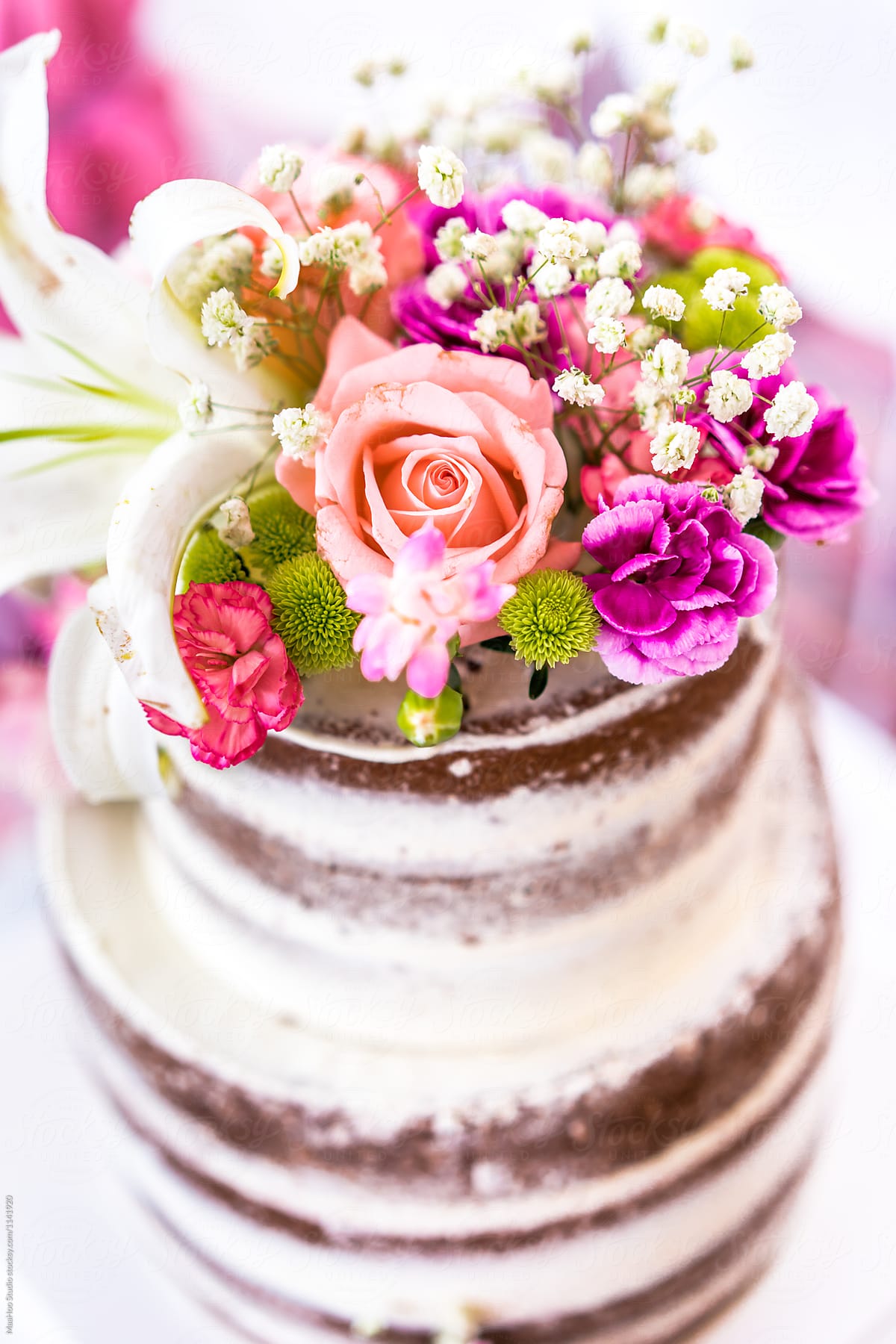 "Multi Layer Cake On A Dessert Table" by Stocksy Contributor "MaaHoo ...