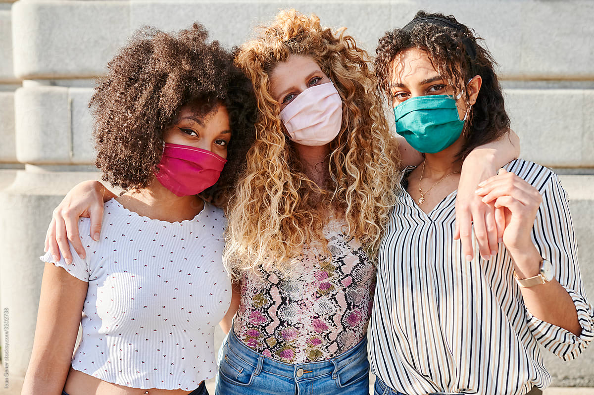 "Friends Standing Together Wearing Protective Face Masks" by Stocksy ...
