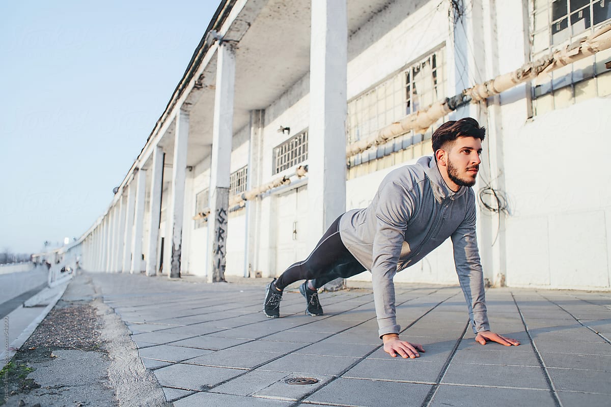 "Man Doing Exercise Outside." by Stocksy Contributor "Studio Firma ...