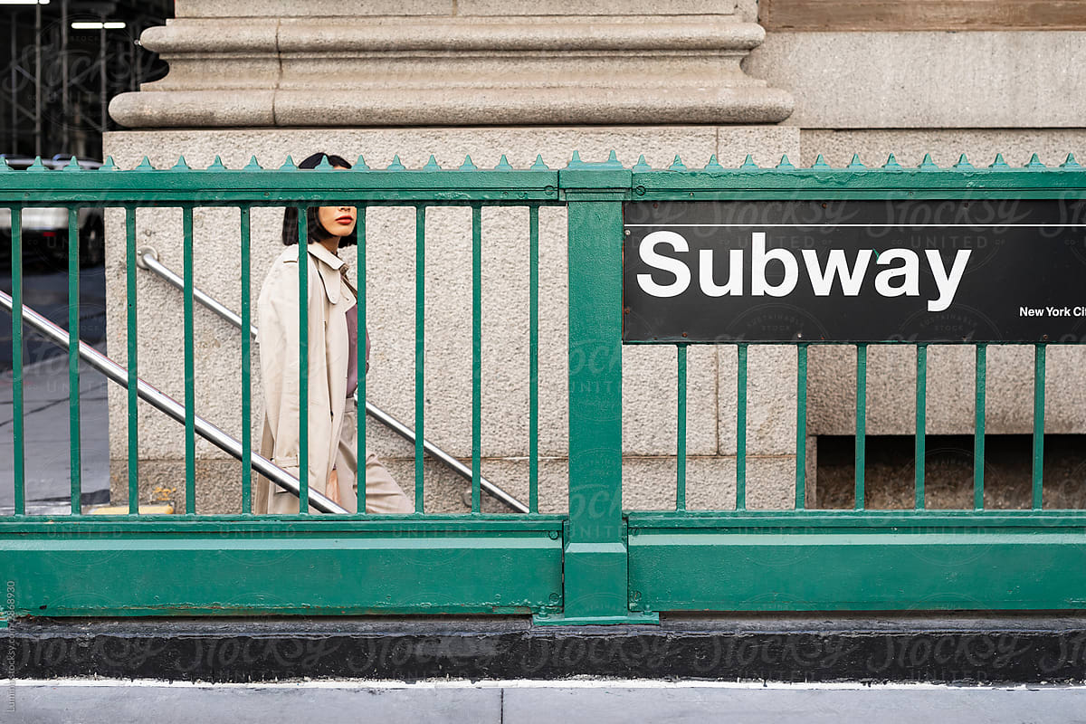 "A Woman Walking To Subway" by Stocksy Contributor "Lumina" - Stocksy