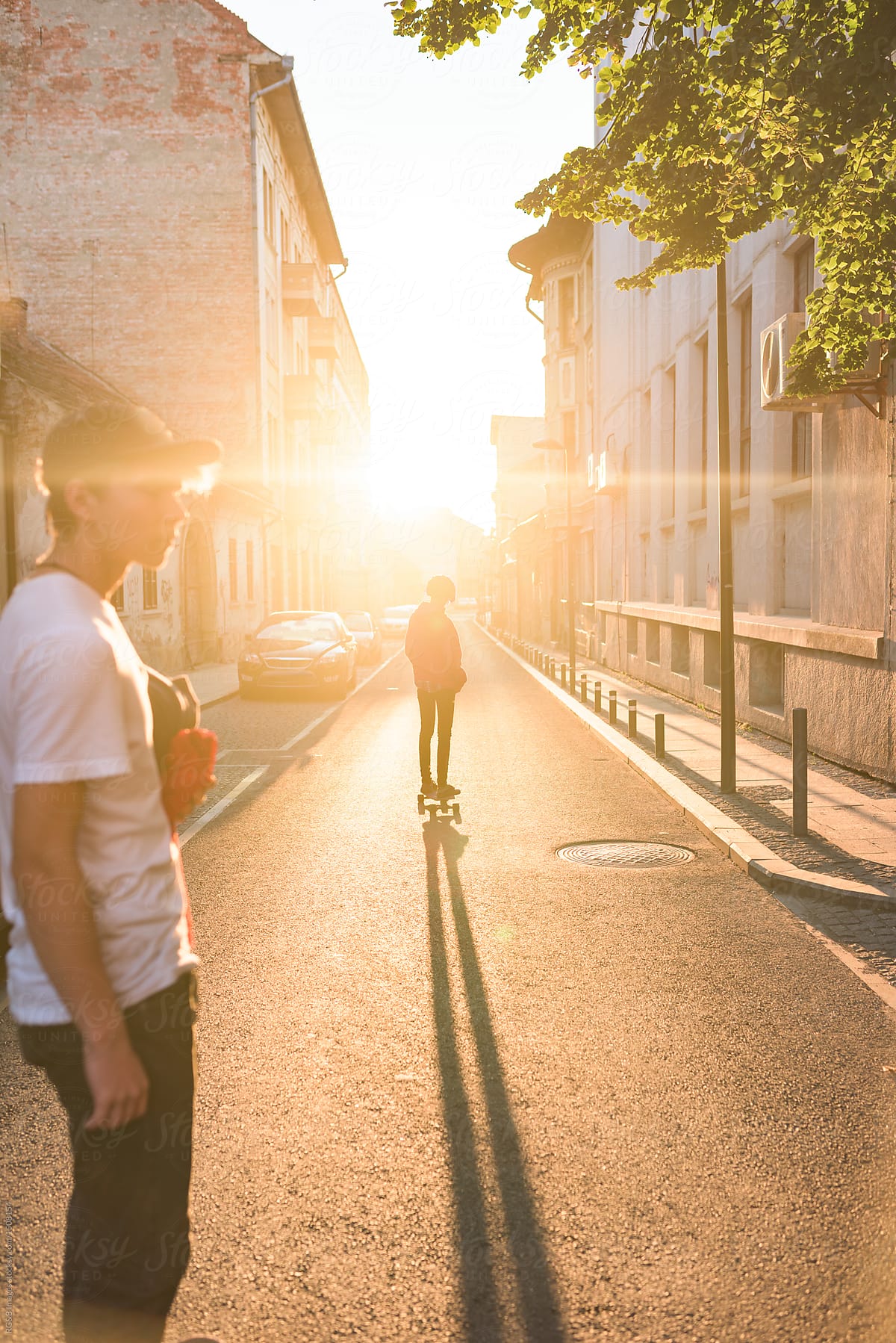 "Urban Lifestyle Shot Of Teenagers Skateboarding On The City Streets ...