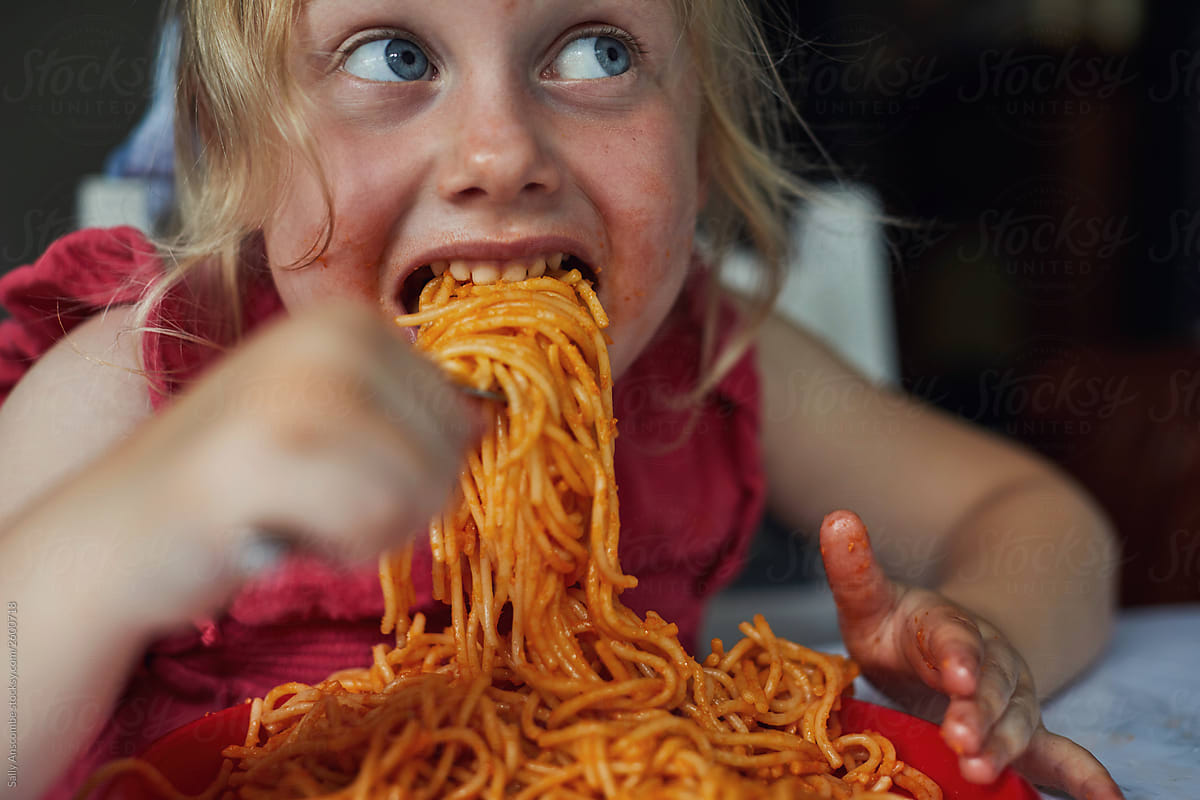 Kid Eating Pasta