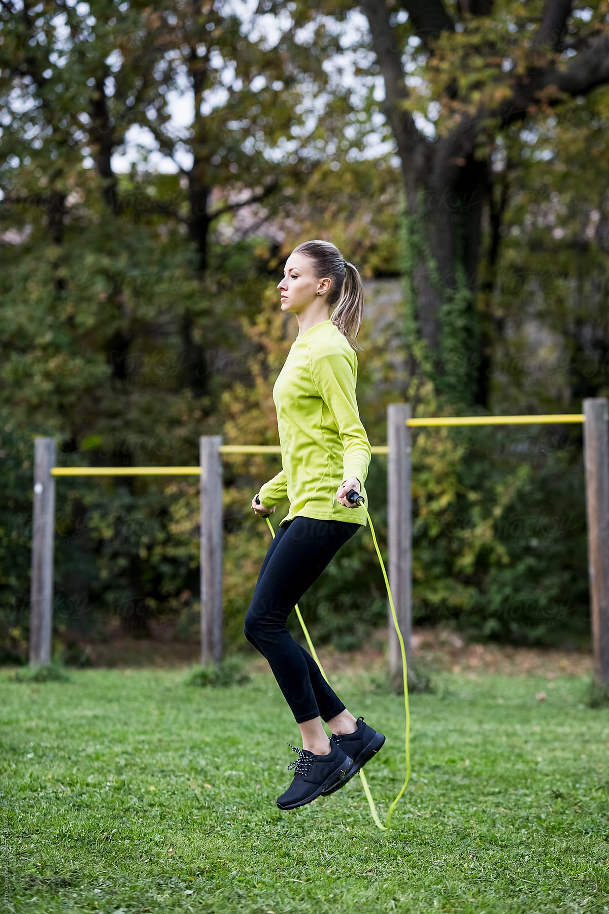 "Woman During Workout At The Park" by Stocksy Contributor "Mauro ...