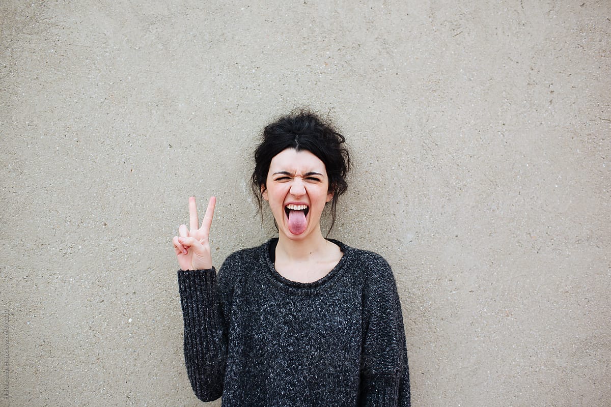 "Facial Expression Of A Young Caucasian Woman: Funny" by Stocksy ...