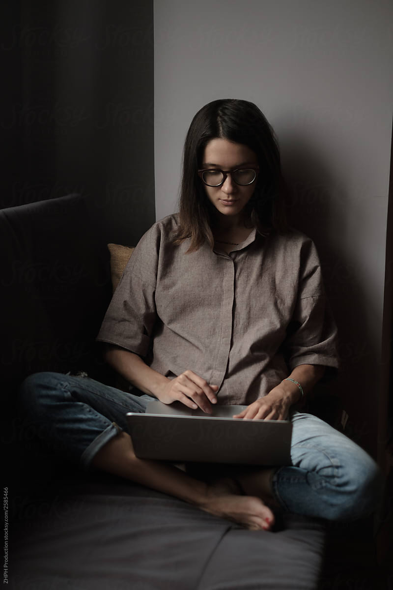 "Woman Working Online At Home" by Stocksy Contributor "Artem Zhushman ...