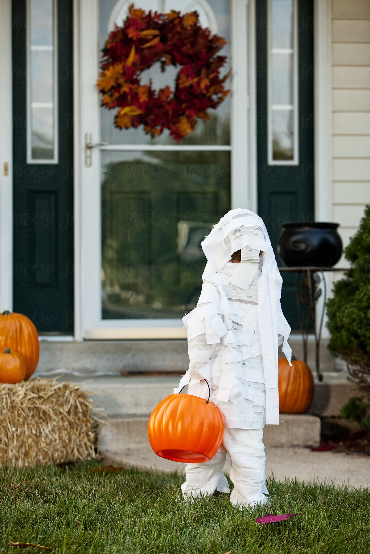 "Halloween: Boy Mummy Walks Towards Front Door" by Stocksy Contributor ...