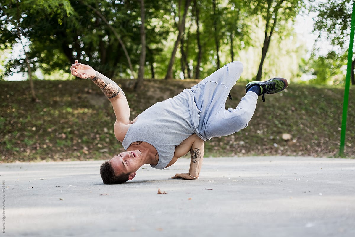 "Man Doing Yoga Poses Outdoor" by Stocksy Contributor "Mauro Grigollo ...