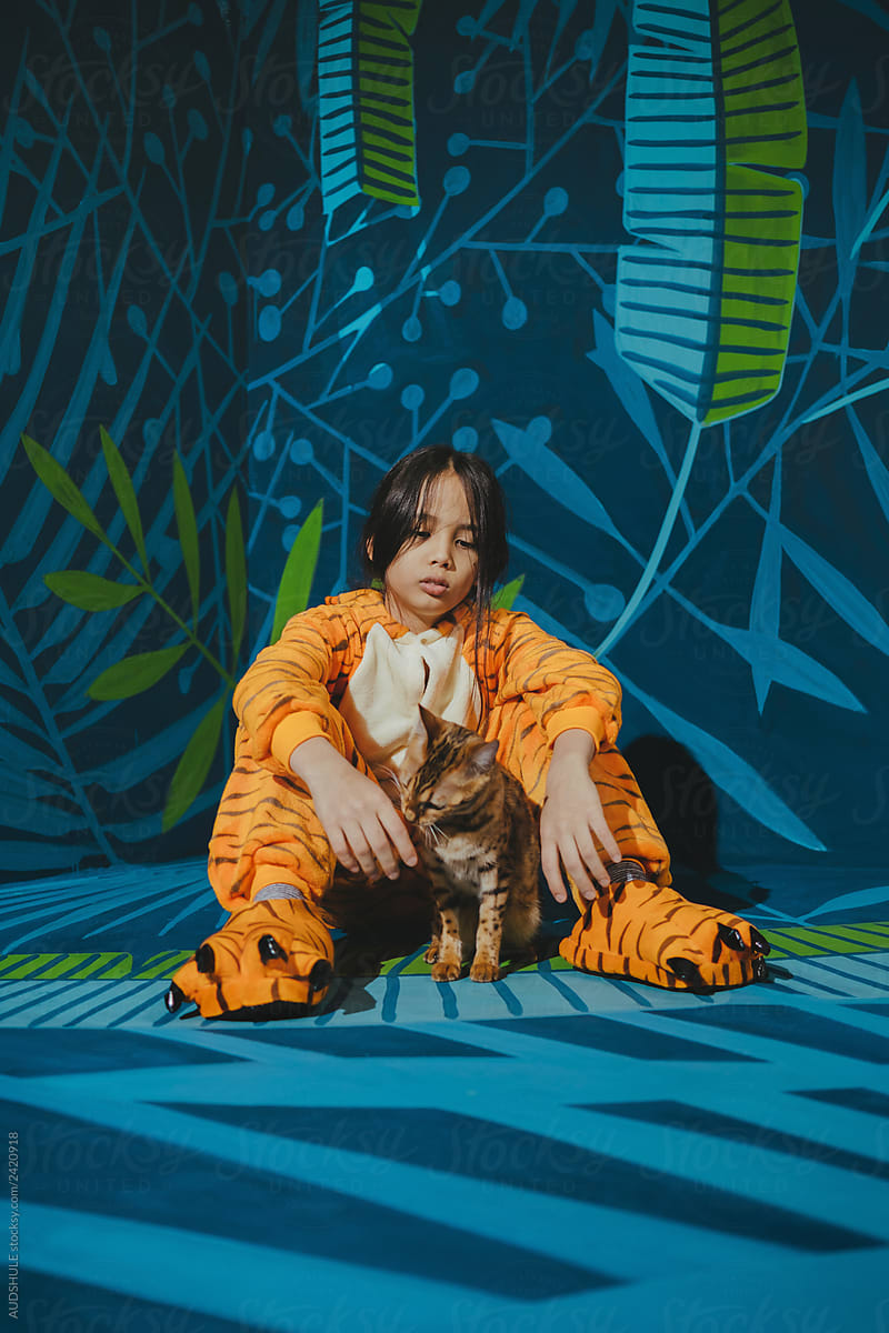 "Jungle Kid / Tiger Kid" by Stocksy Contributor "AUDSHULE" - Stocksy
