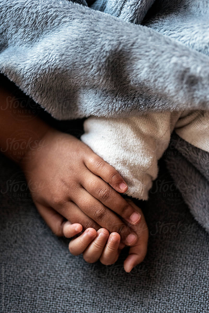 "Close Up Of Children Hands" by Stocksy Contributor "Santi Nuñez" - Stocksy