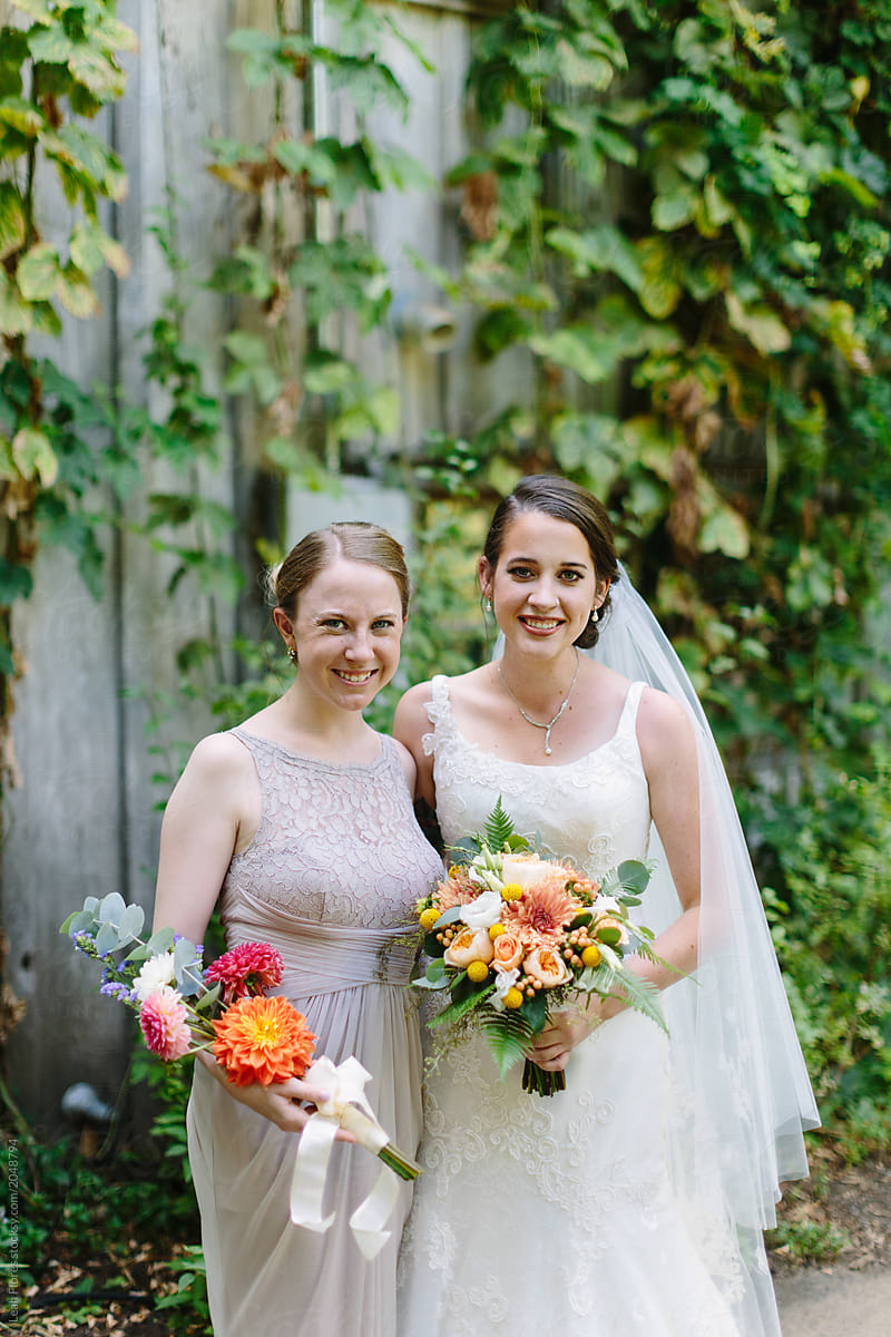 "Portrait Of Bride And Bridesmaid" by Stocksy Contributor "Leah Flores ...
