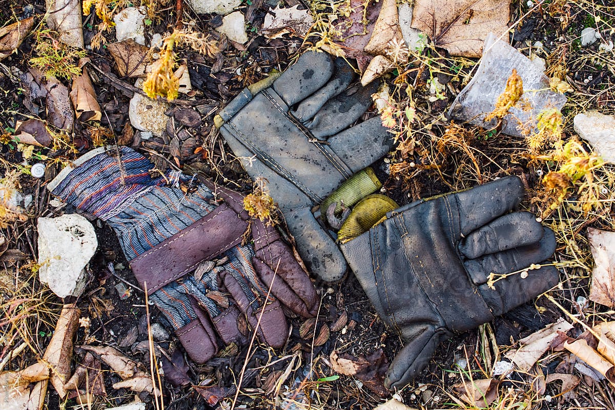 "Old Work Gloves On The Ground" by Stocksy Contributor "Sibila and ...