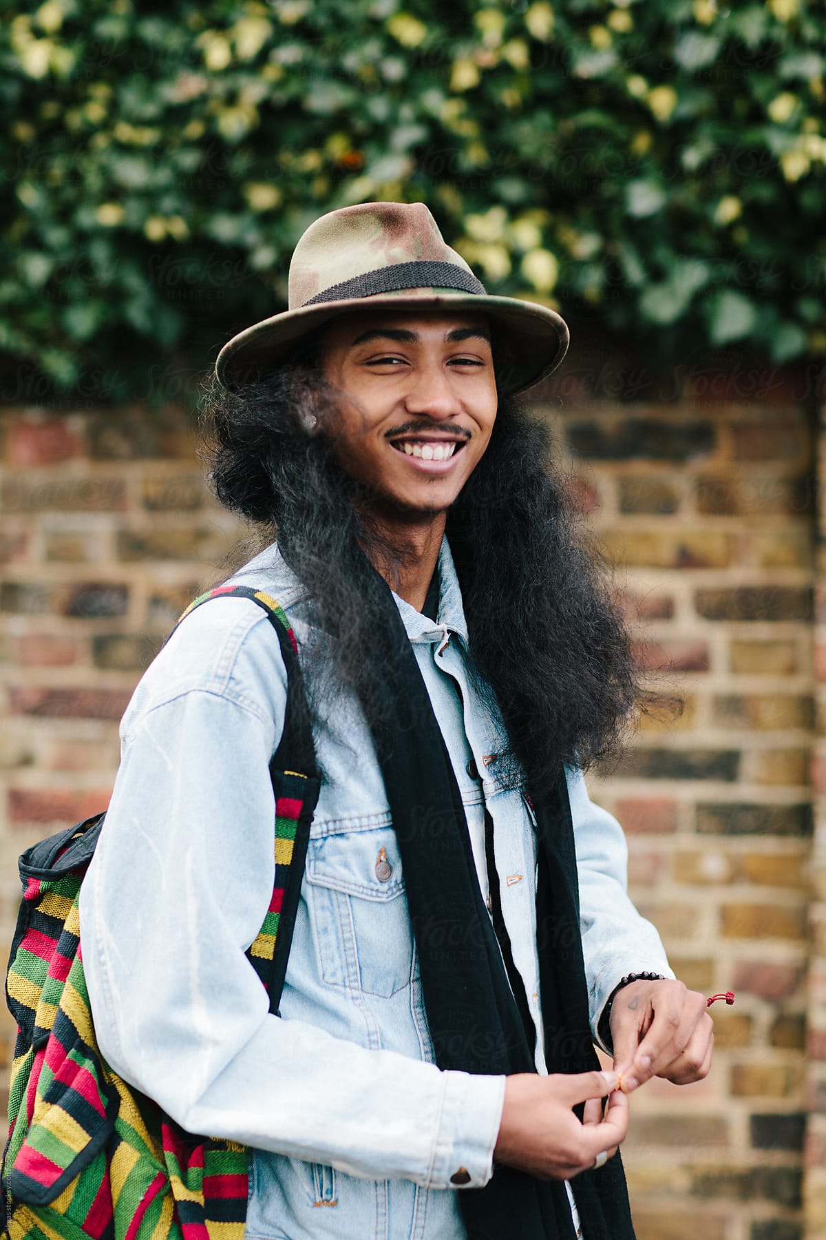 "Portrait Of Stylish Mixed Race Man" by Stocksy Contributor "Kkgas ...