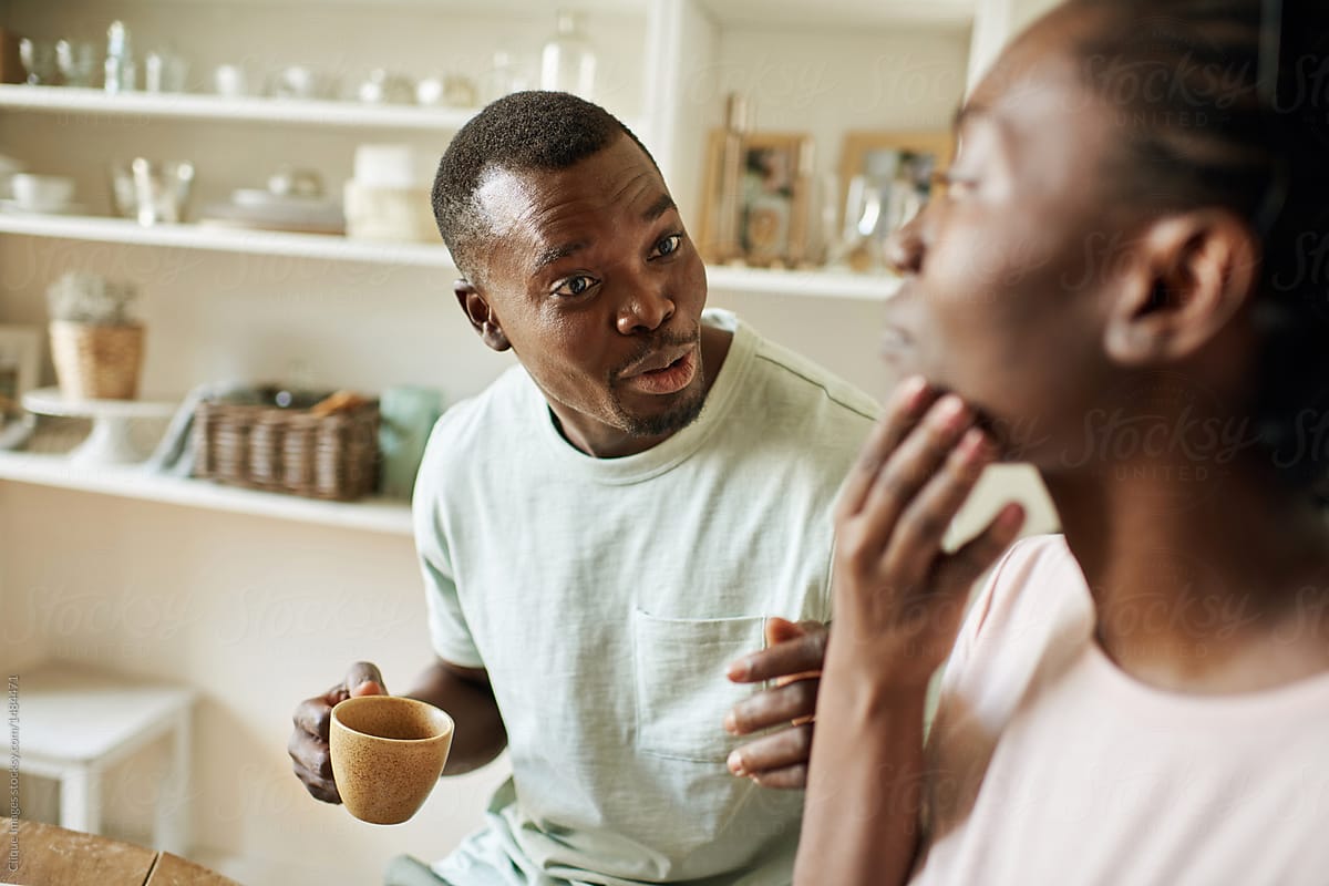 "Morning Coffee Talk" by Stocksy Contributor "Clique Images" - Stocksy