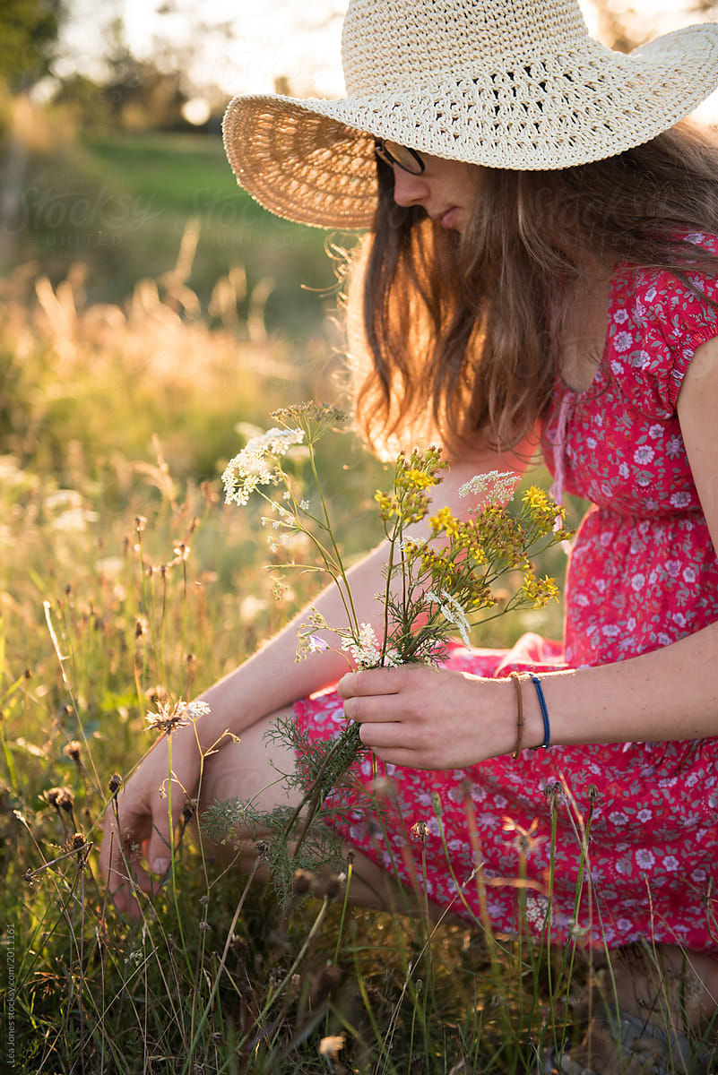 "Young Woman Sitting In The Sunshine." by Stocksy Contributor "Lea ...