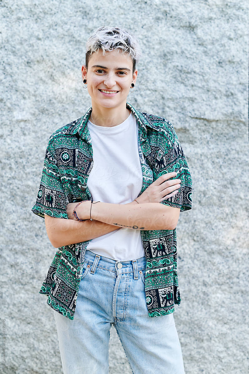 "Smiling Young Person Standing Outside" by Stocksy Contributor "Ivan ...