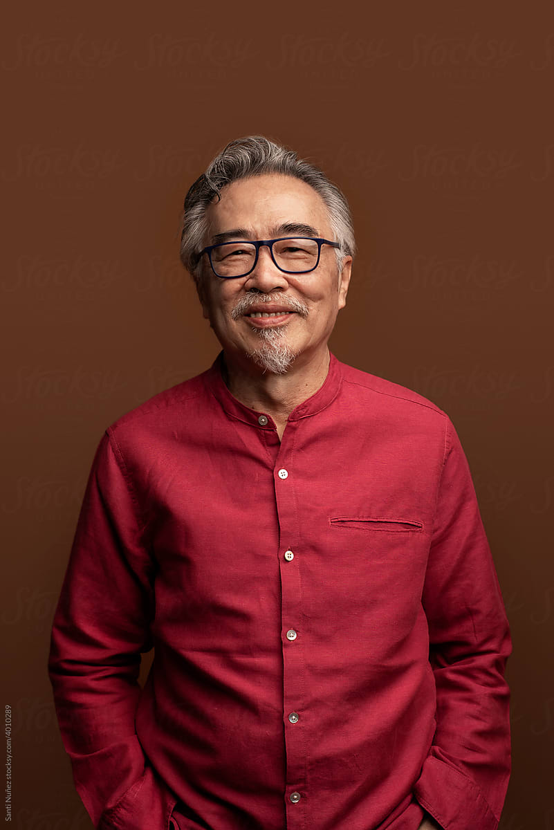 "Happy Asian Man In Studio Shot" by Stocksy Contributor "Santi Nuñez ...