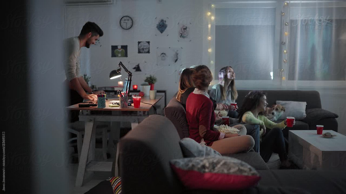 "Movie Night At Home With Group Of Friends" by Stocksy Contributor ...