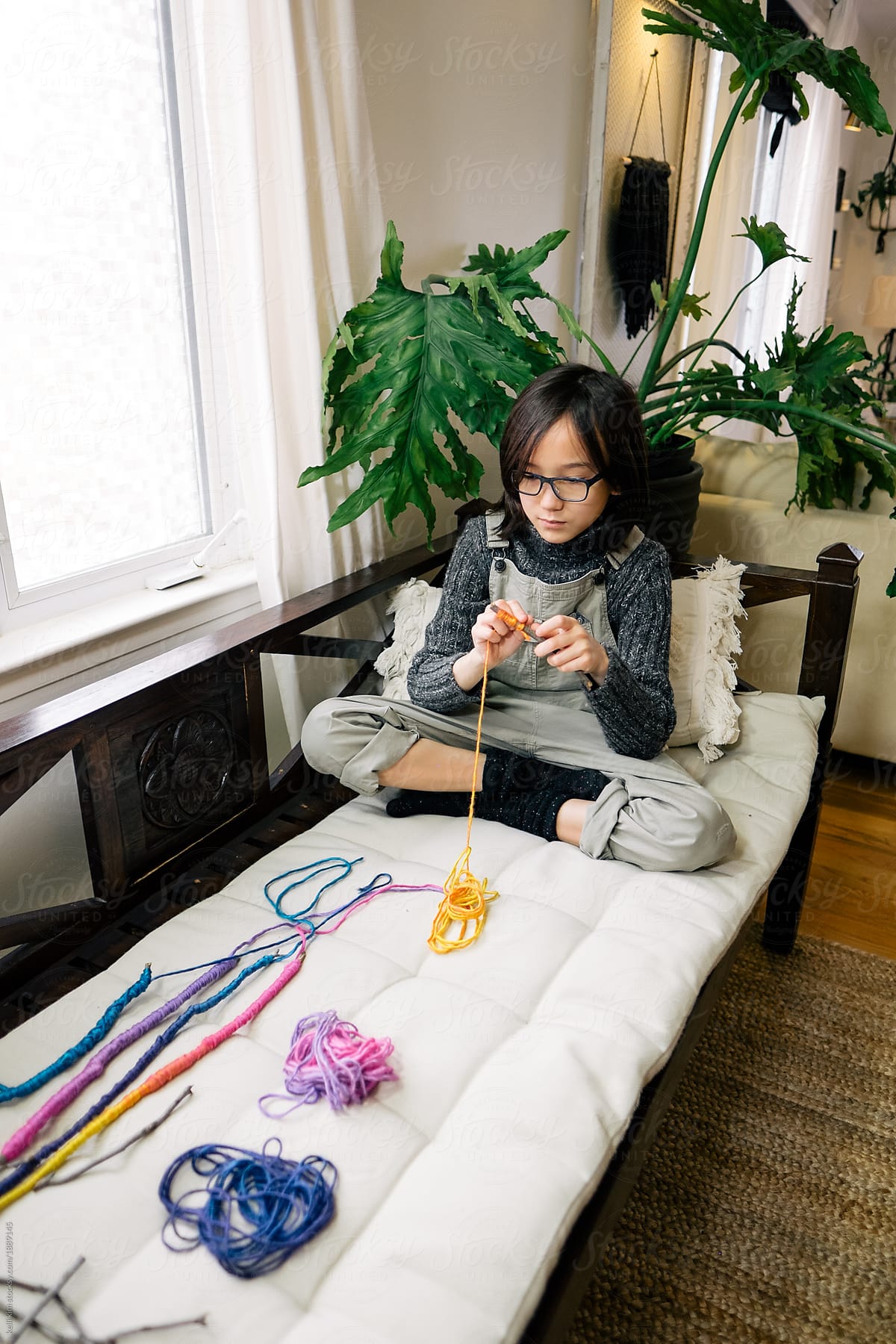 "Boy Makes Yarn Decoration" by Stocksy Contributor "Kelli Seeger Kim ...