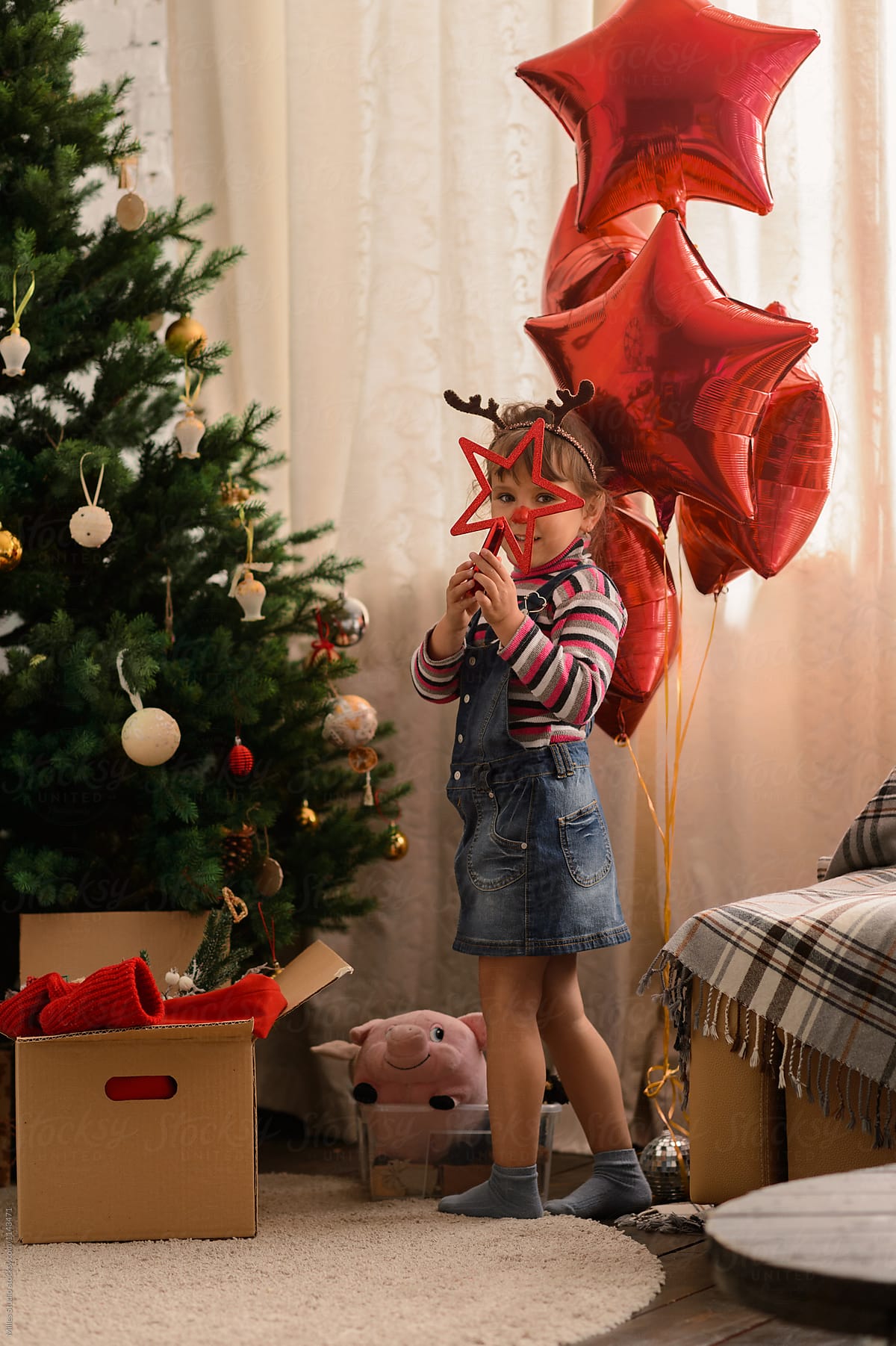 "Christmas Child" by Stocksy Contributor "Milles Team" - Stocksy