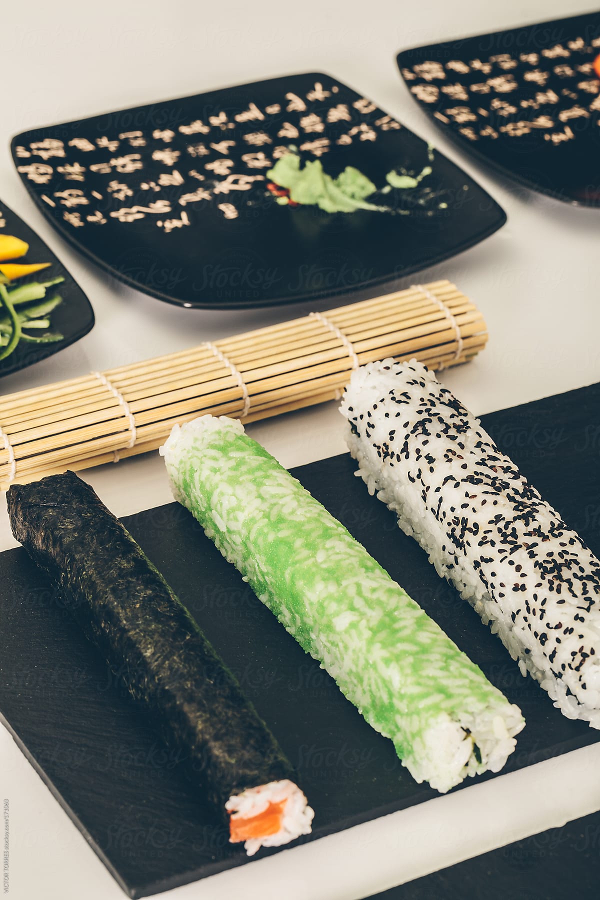 "Maki And Uramaki Rolls" by Stocksy Contributor "VICTOR TORRES" - Stocksy