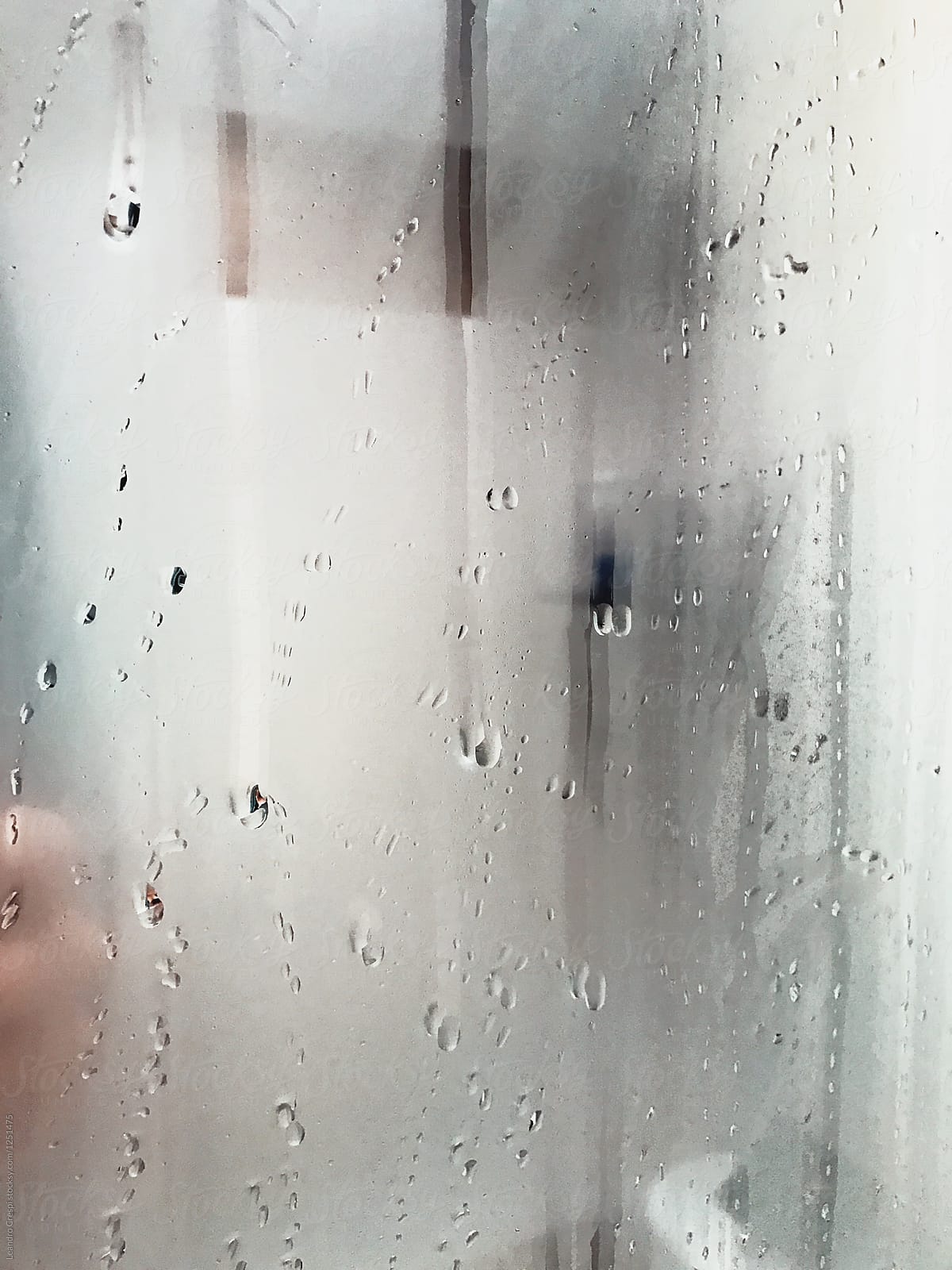 "Drops Running Down A Mirror" by Stocksy Contributor "ohlamourstudio ...