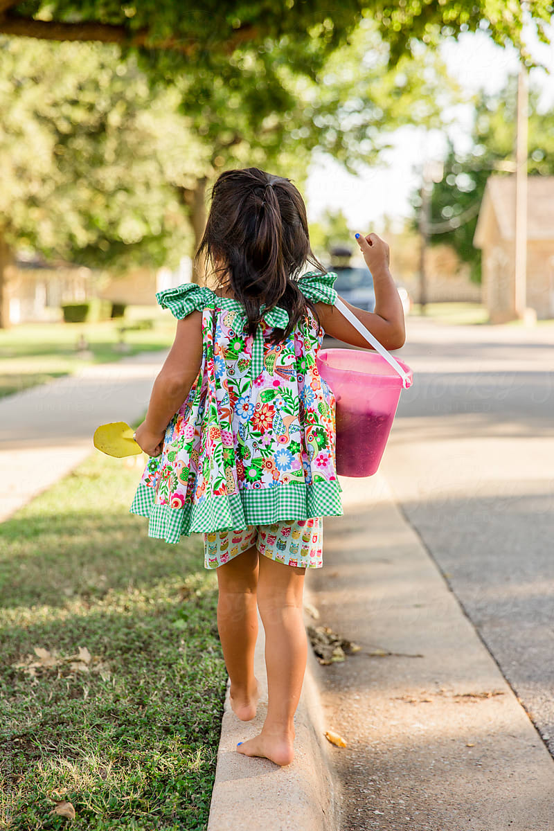 "Young Girl Walking On Curb" by Stocksy Contributor "Mel Karlberg ...