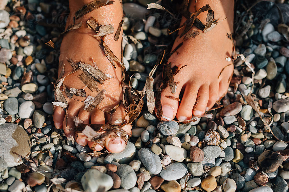 "Seaweed On Feet" by Stocksy Contributor "Evgenij Yulkin" - Stocksy
