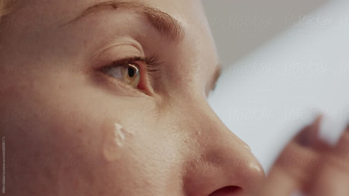 "Closeup Of Woman Applying Cream On Face" by Stocksy Contributor ...