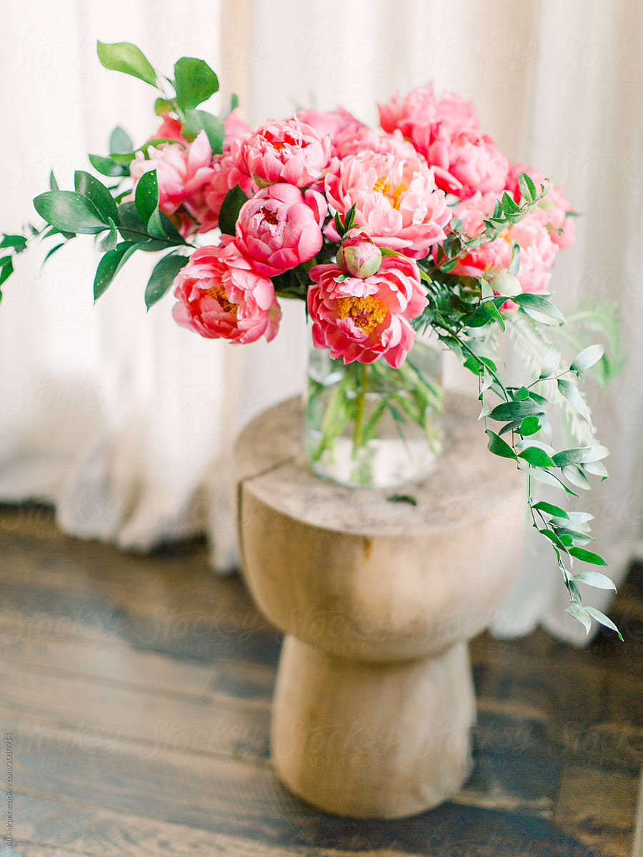 "Pink Peonies In Glass Vase" by Stocksy Contributor "Ali Harper" - Stocksy
