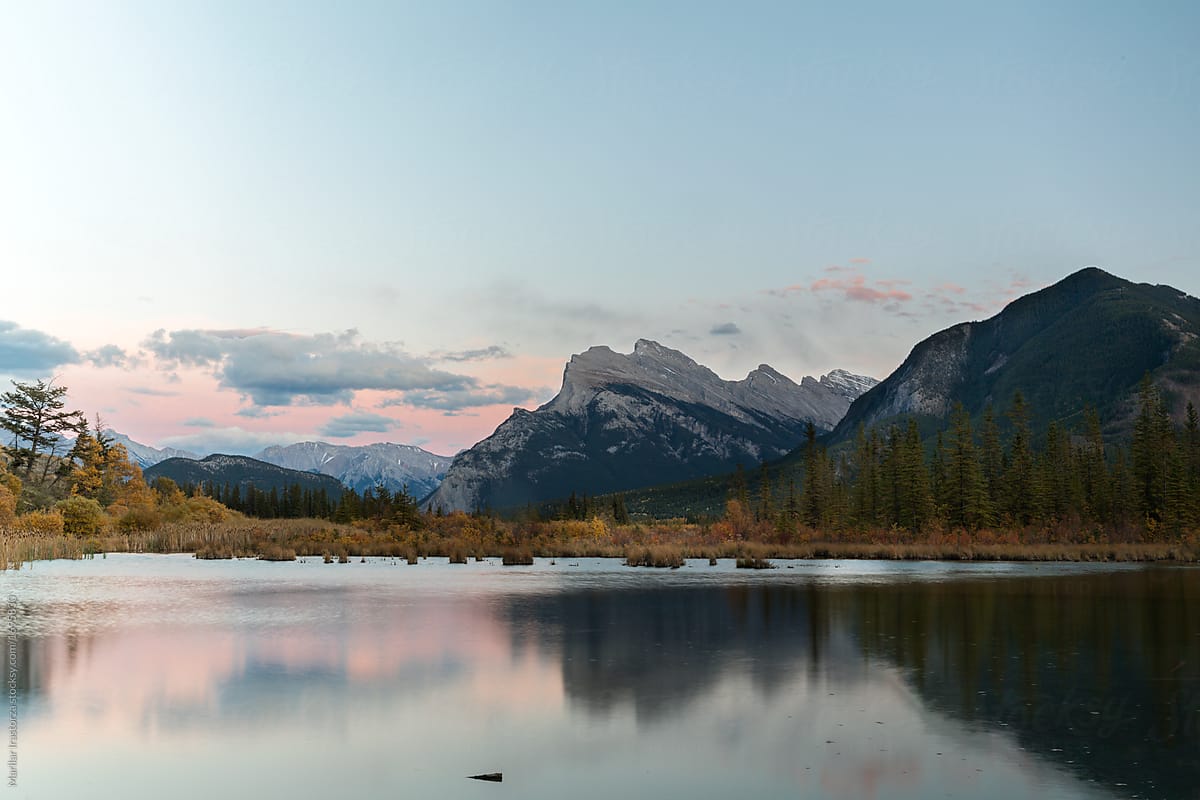 "Sunset Over A Canadian Lake" by Stocksy Contributor "Marilar Irastorza ...