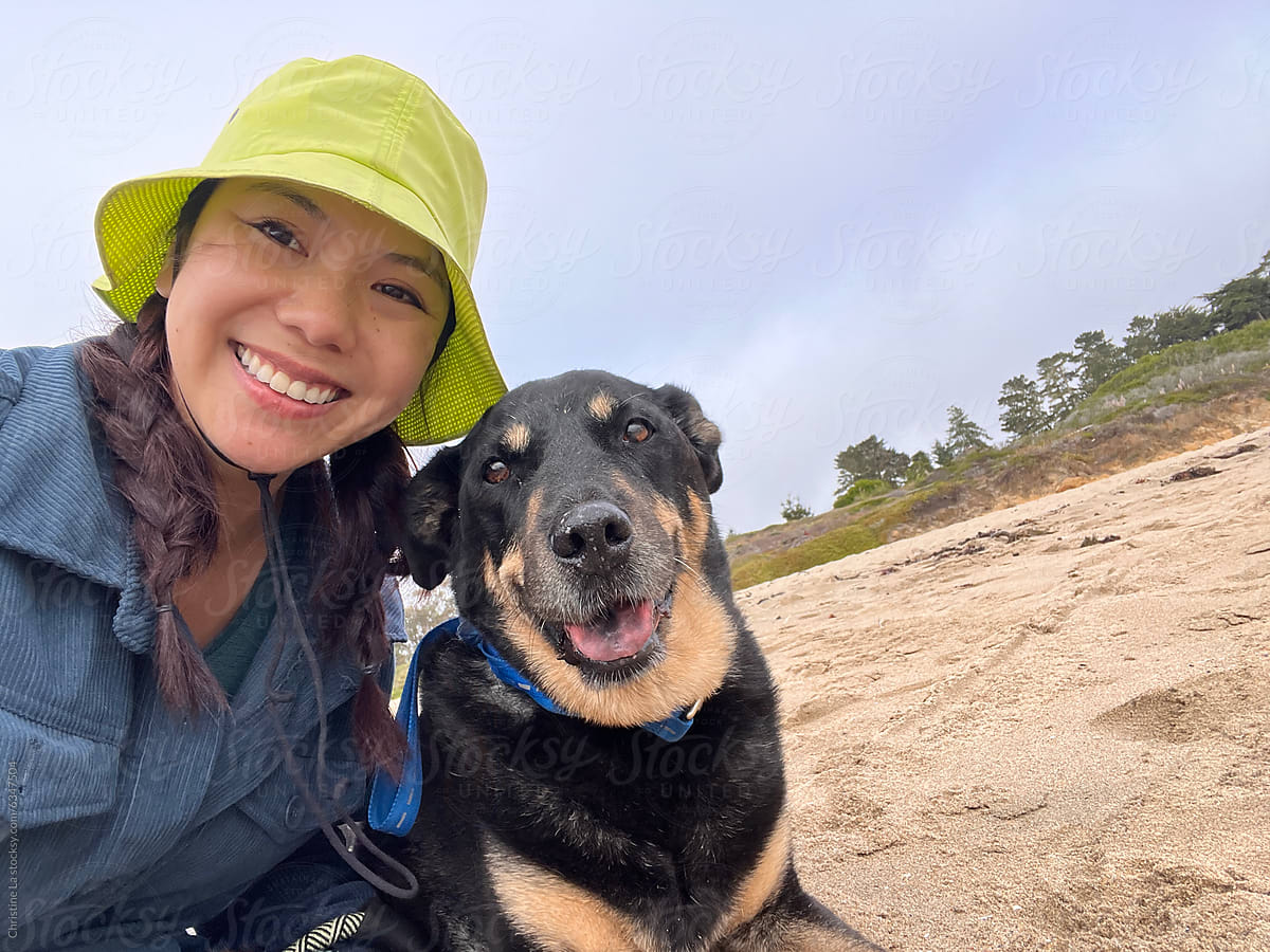 "Ugc Selfie Dog Beach" by Stocksy Contributor "Christine La" - Stocksy