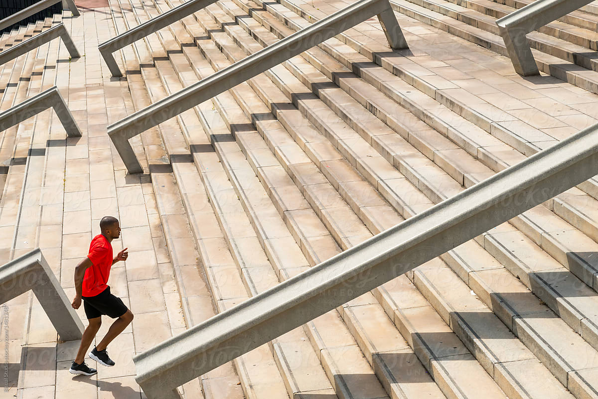 "Sportsman Running Up Stairs" by Stocksy Contributor "Bisual Studio ...