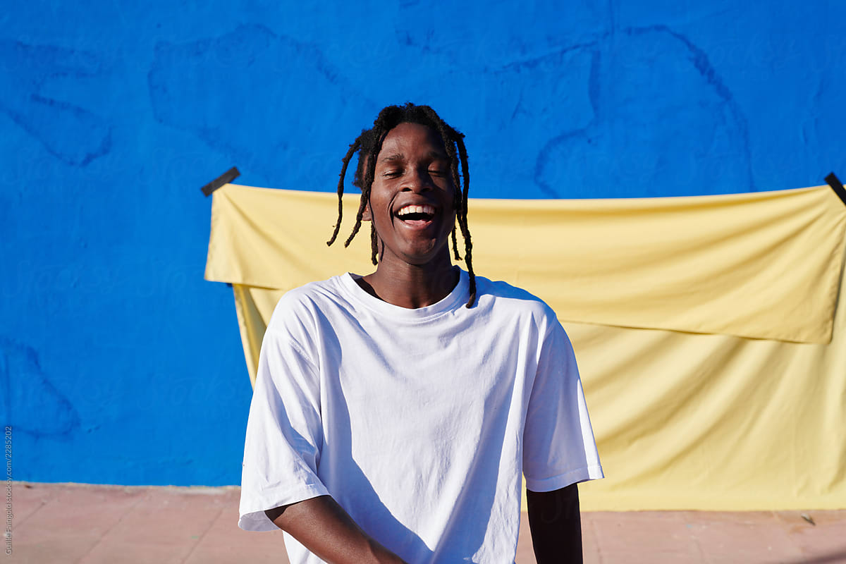 "Laughing Black Man Outdoors In Bright Sunshine" by Stocksy Contributor ...