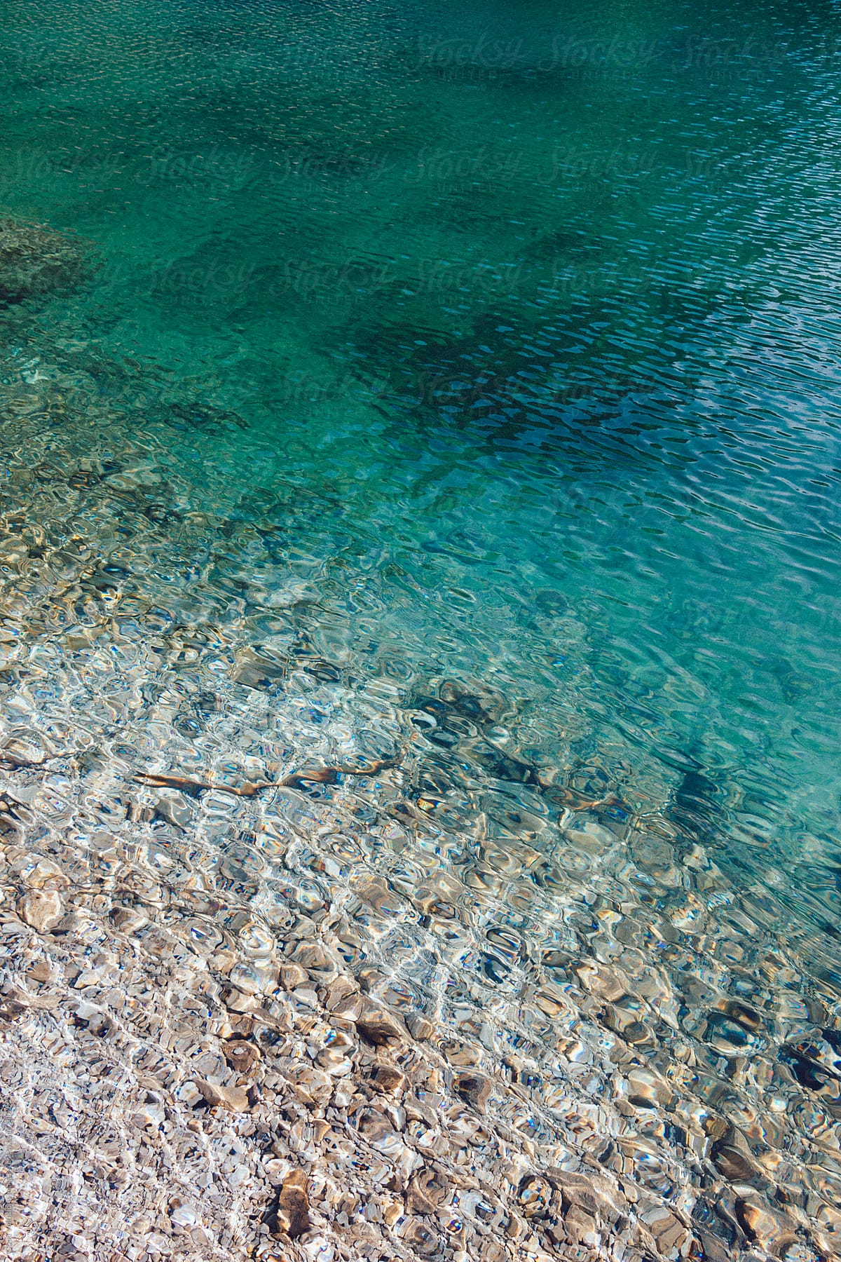 "Transparent Water Of A Lake" by Stocksy Contributor "Vero." - Stocksy