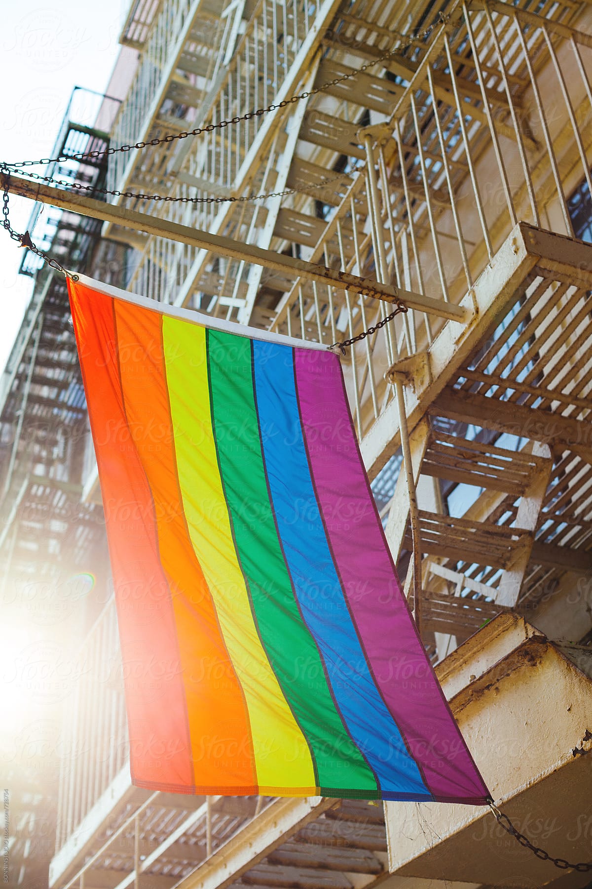 "Gay Flag Holding From A Balcony Of A Building." by Stocksy Contributor ...