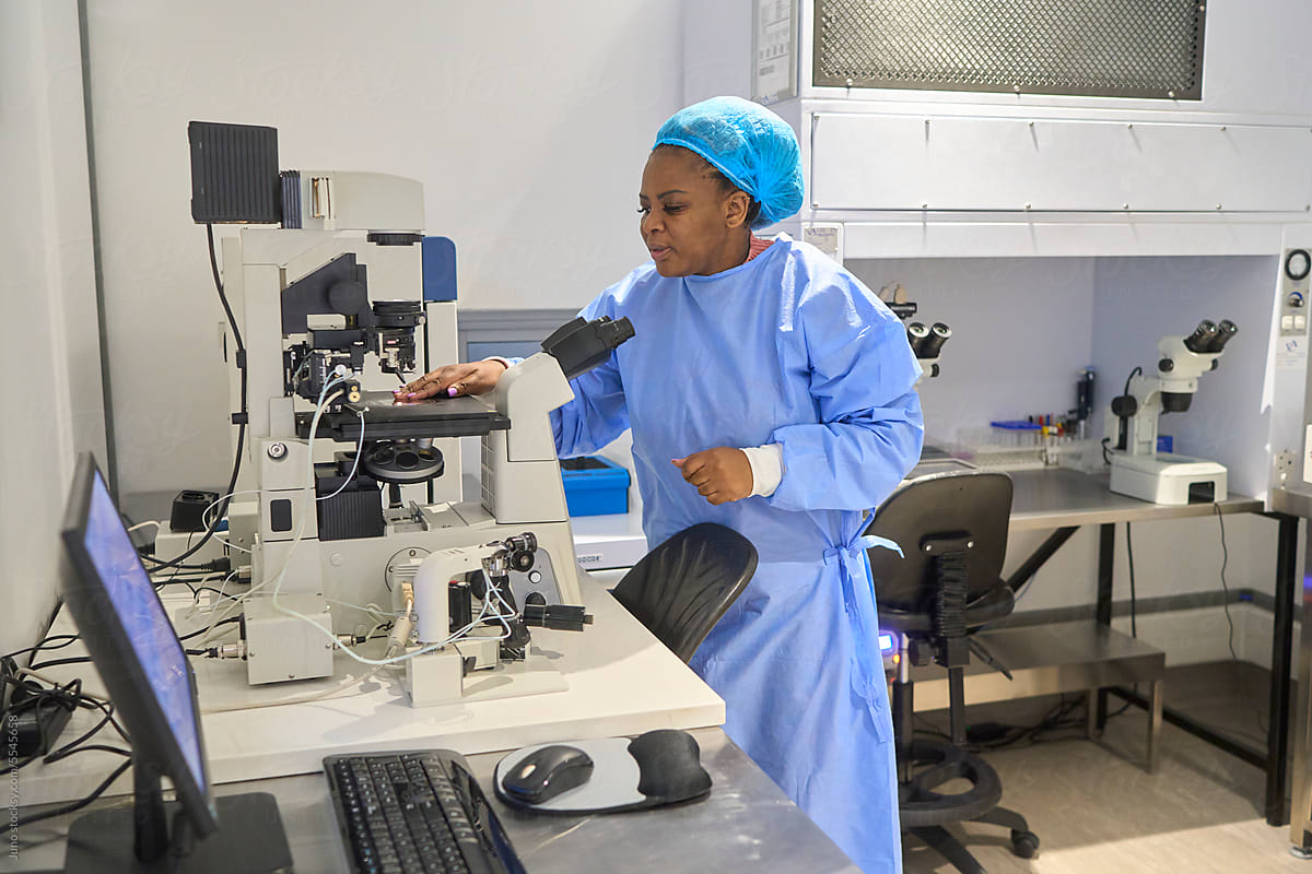 "Embryologist In IVF Lab" by Stocksy Contributor "Juno" - Stocksy