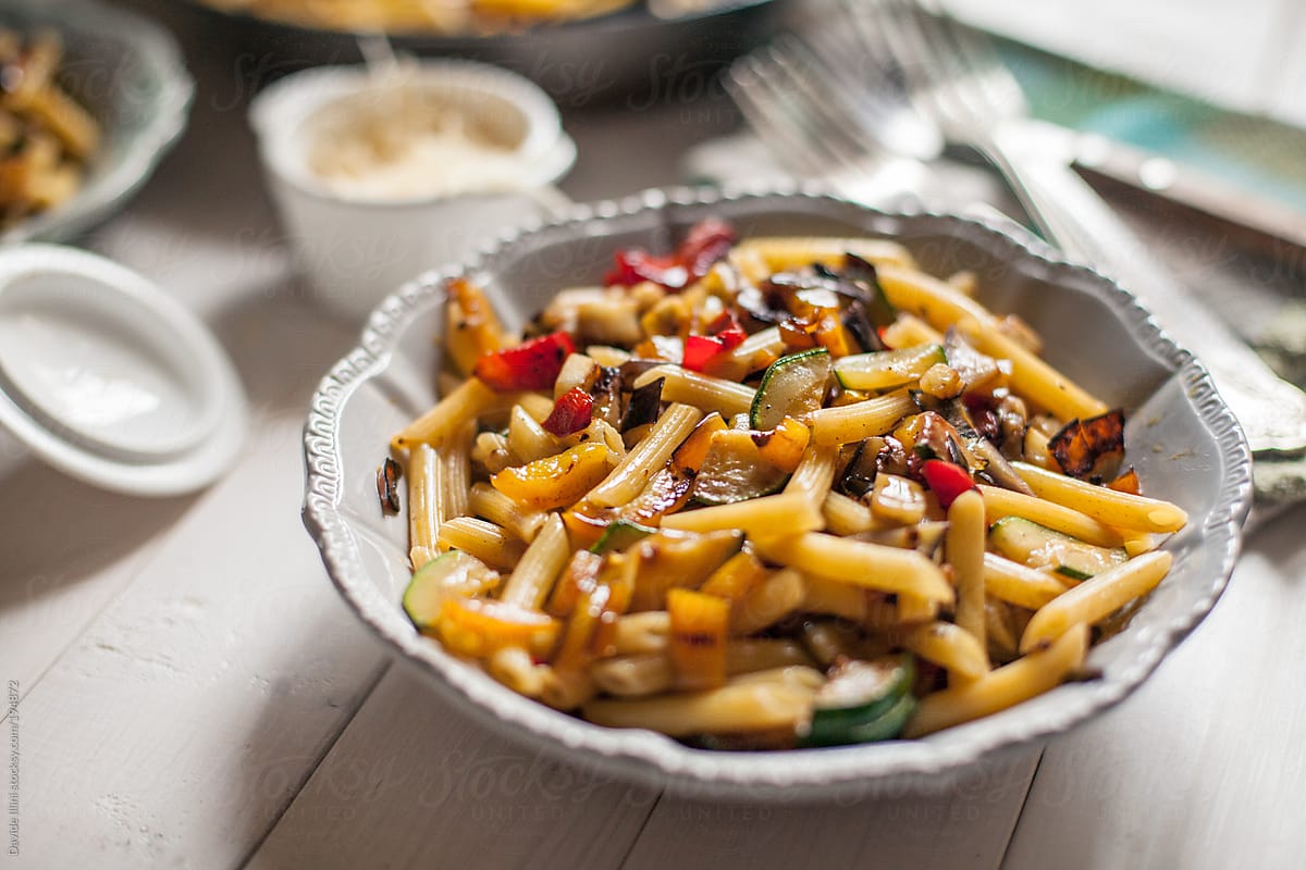 "Pasta With Mixed Vegetables" by Stocksy Contributor "Davide Illini ...