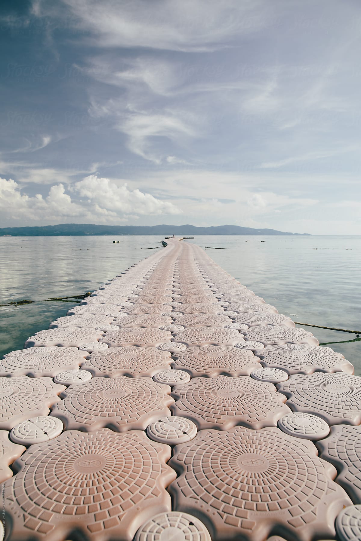"Floating Way To The Sea" by Stocksy Contributor "Andrey Pavlov" - Stocksy