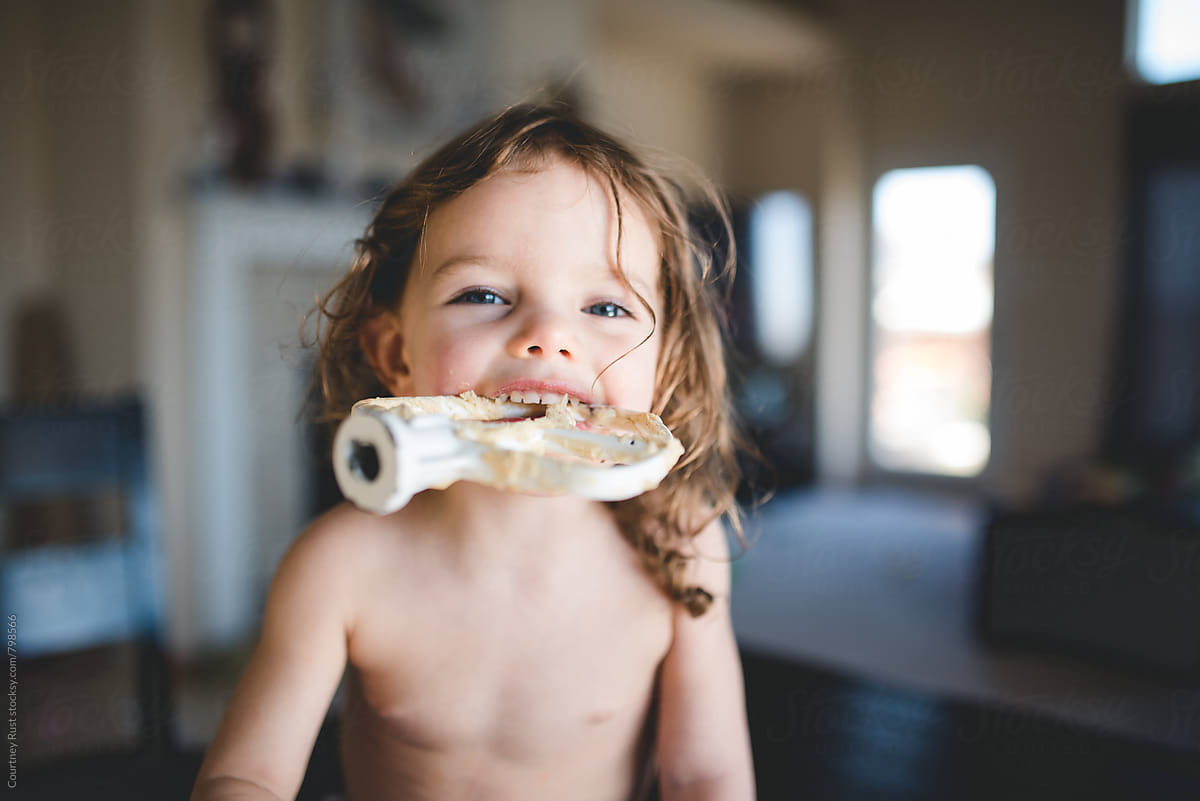 "Making Cookies And Eating Batter" by Stocksy Contributor "Courtney ...