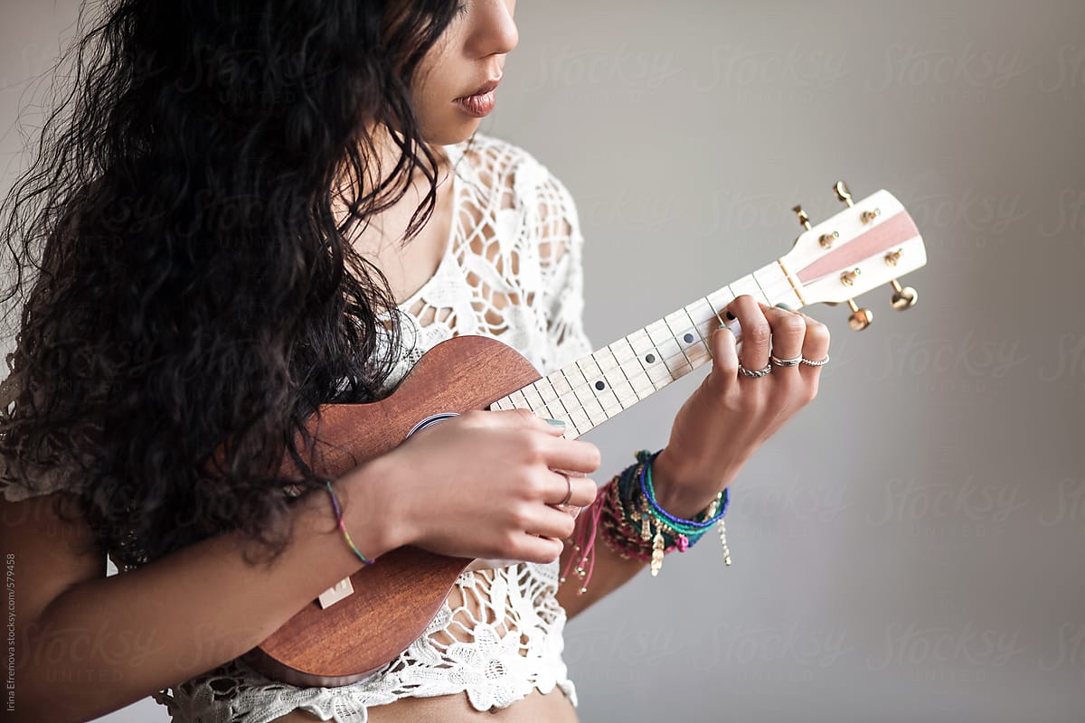 "Girl With Ukulele" by Stocksy Contributor "Irina Efremova" - Stocksy
