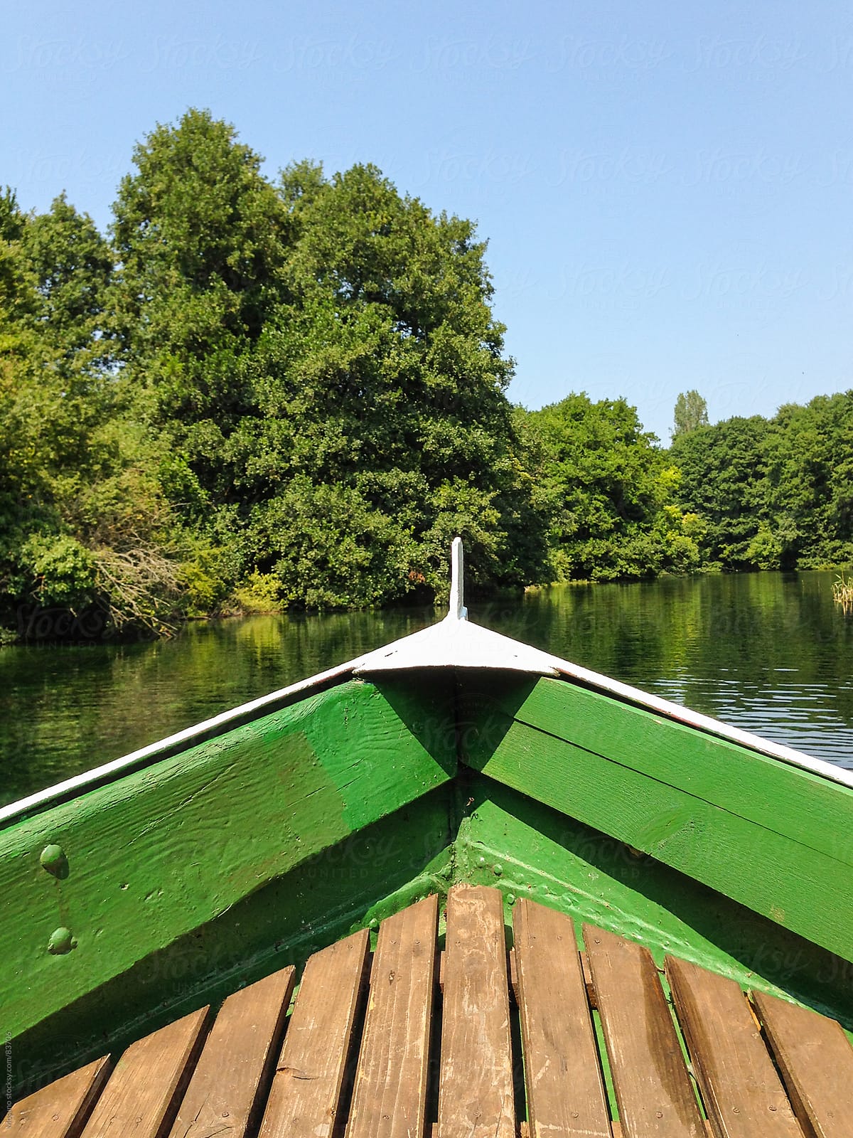 "Boat Ride On The Lake" by Stocksy Contributor "Mosuno" - Stocksy
