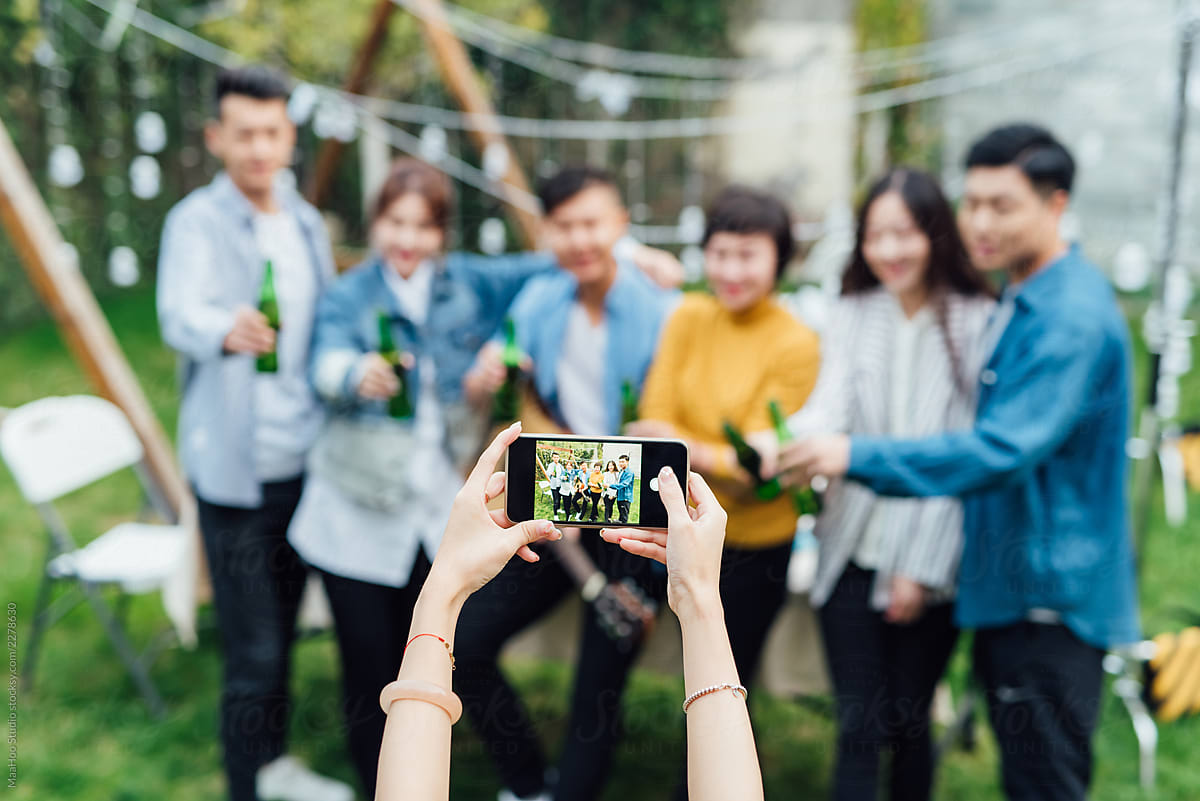 "Group Friends Having Party In The Yard" by Stocksy Contributor "MaaHoo ...