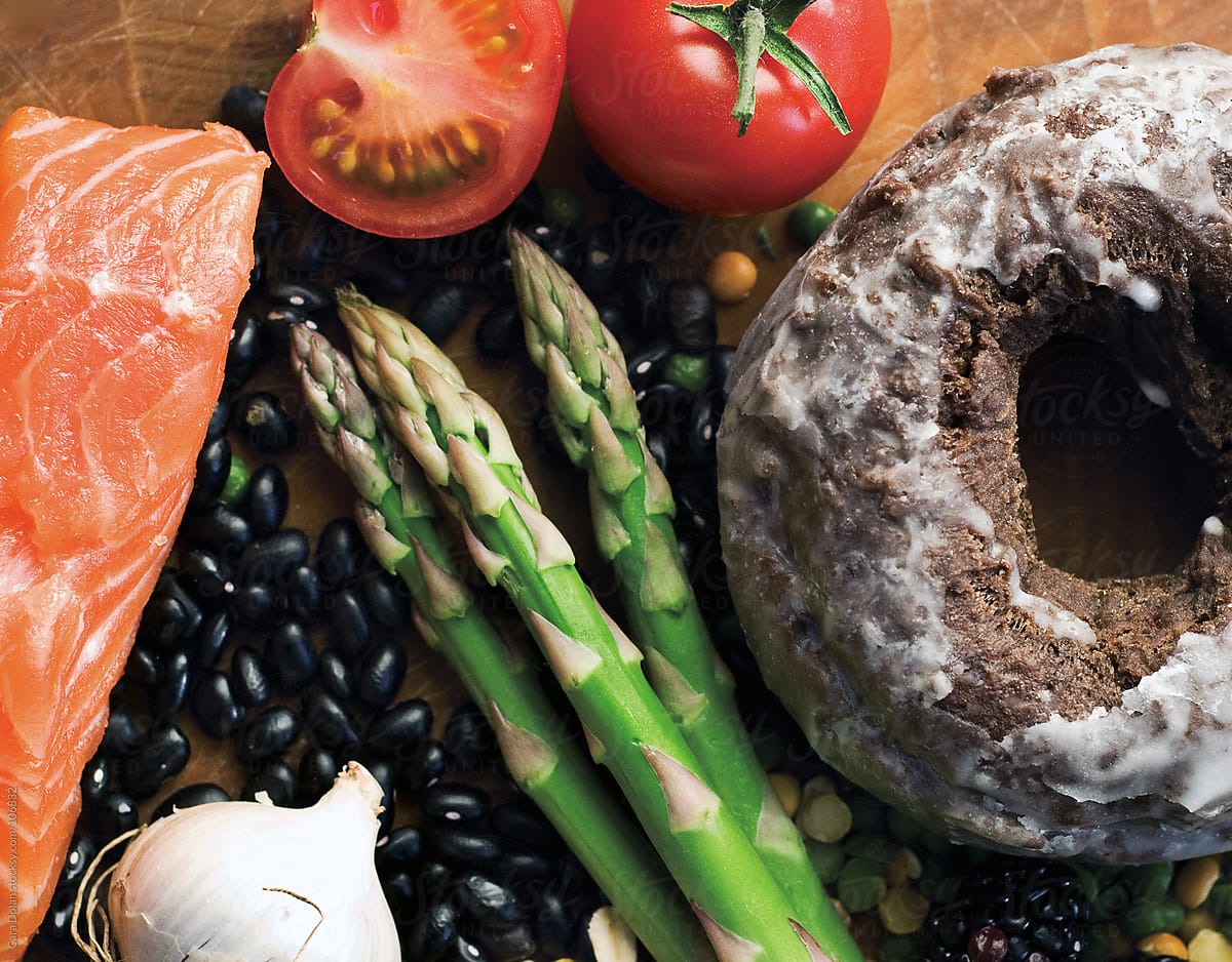 "A Variety Of Healthy, Wholesome Foods With A Chocolate Glazed Doughnut ...