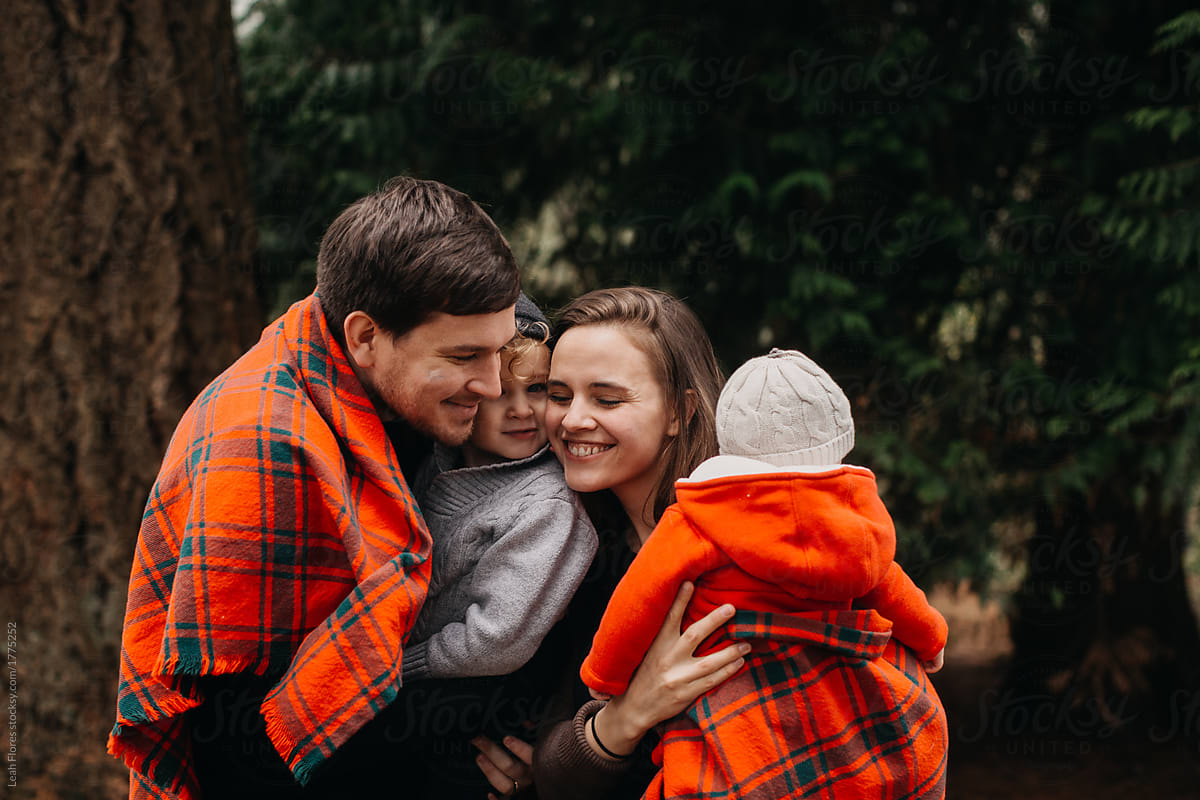 "Portrait Of Cute Family" by Stocksy Contributor "Leah Flores" - Stocksy