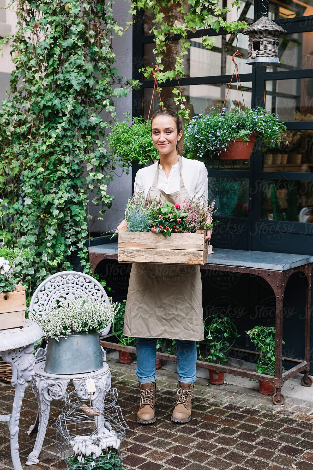 "Florist Standing In Front Of The Flower Shop" by Stocksy Contributor ...