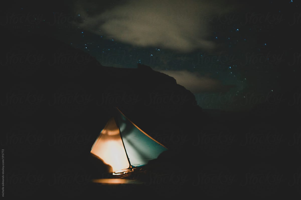 "Glowing Tent At Night" by Stocksy Contributor "Michelle Edmonds" - Stocksy