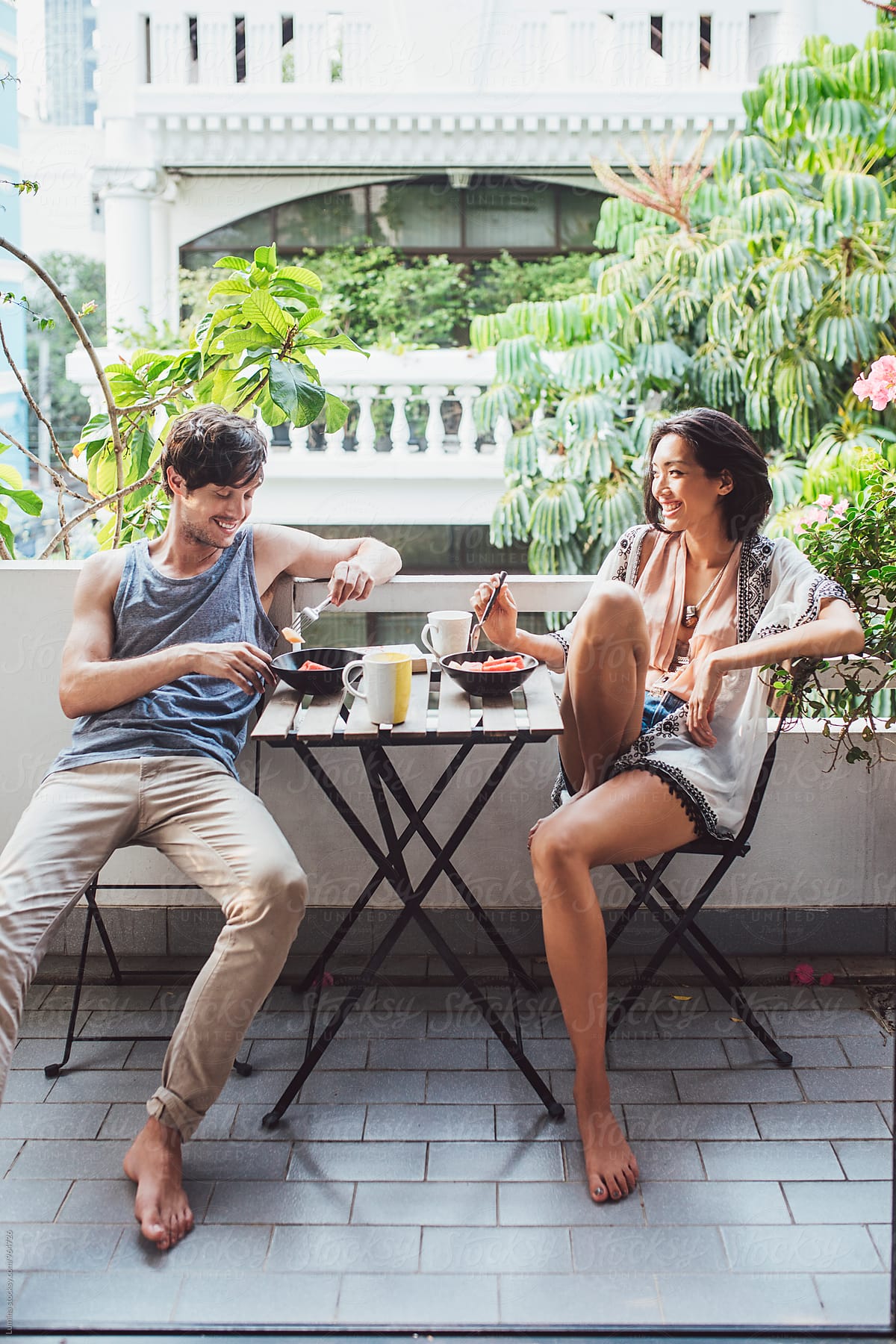 "Couple In Love On The Balcony" by Stocksy Contributor "Lumina" - Stocksy