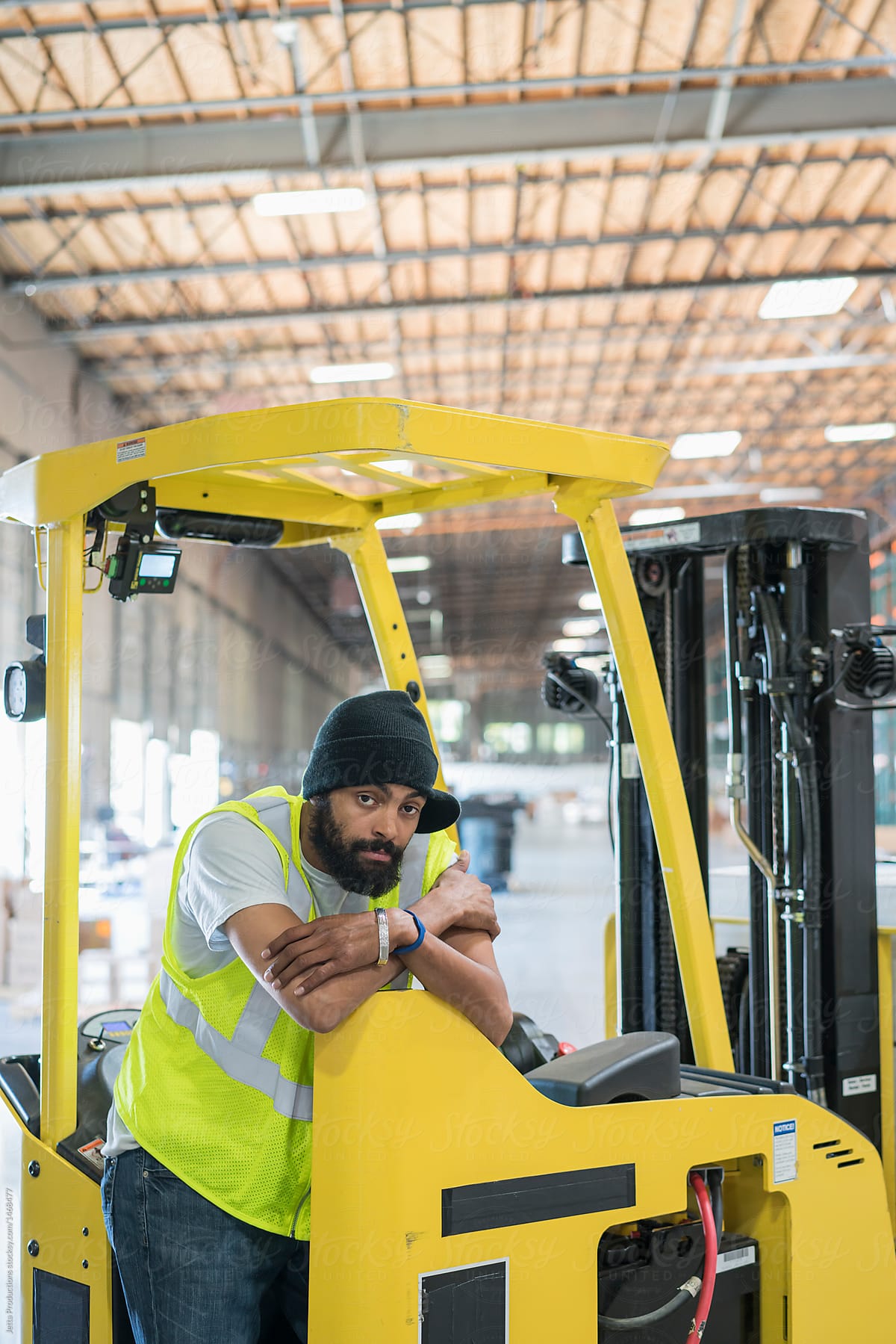 "Warehouse Worker Portrait" by Stocksy Contributor "Walter And Deb ...